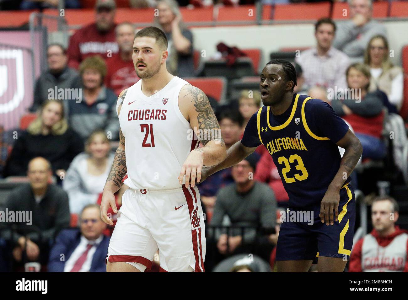 Washington State center Jack Wilson (21) and California forward Obinna ...