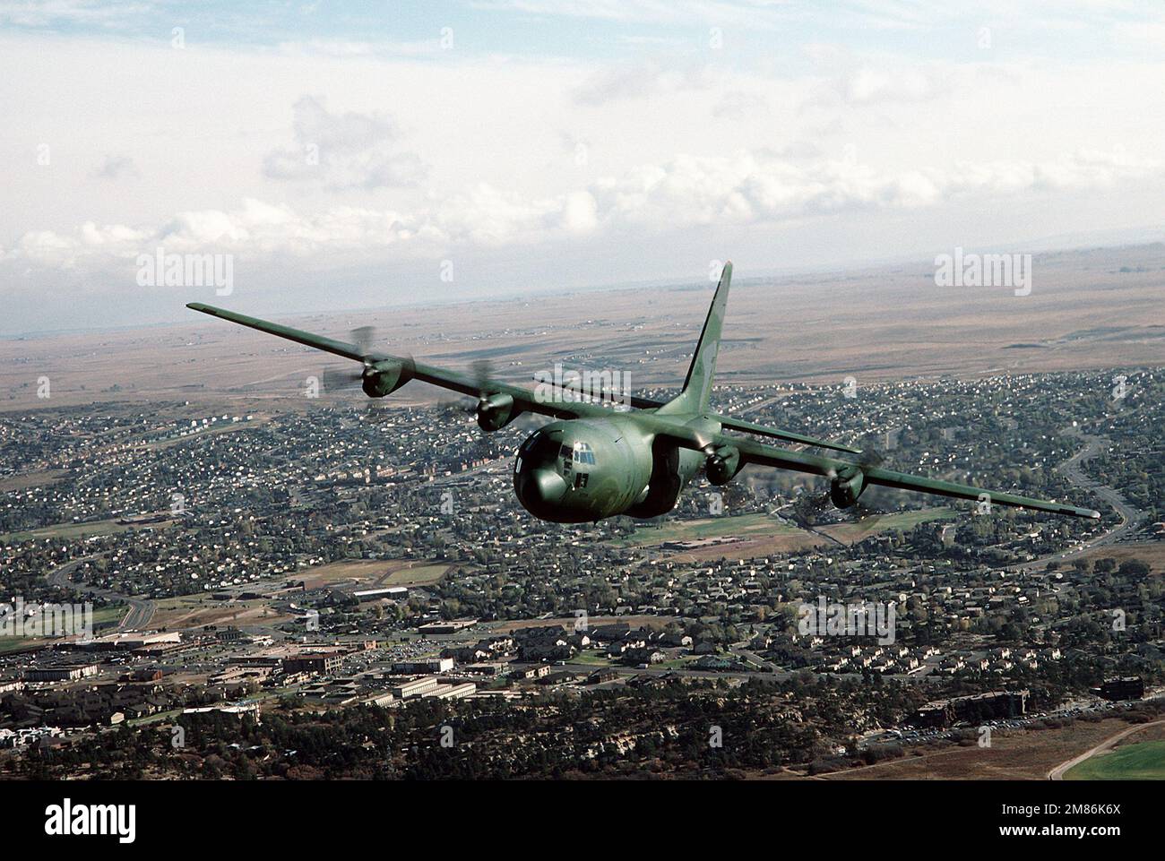 An air-to-air front view of a 731st Tactical Airlift Squadron C-130B ...