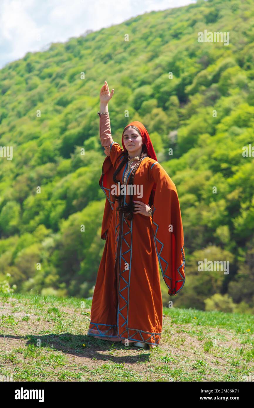 Georgian girl in national costume dances Georgian national dances ...