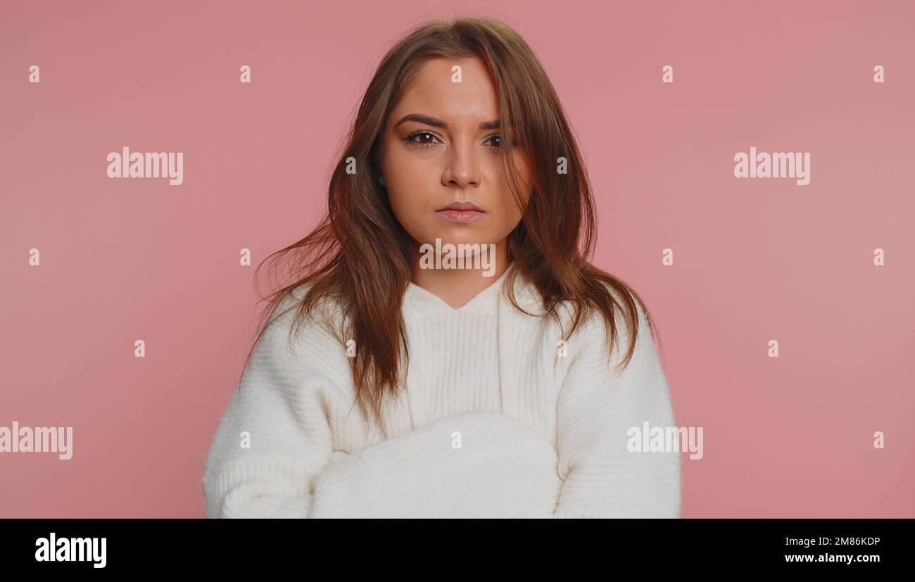 Woman in white sweater screams yell from stress tension problems feels ...