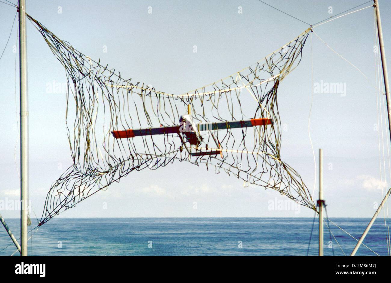 A Pioneer I remotely-piloted vehicle (RPV) approaches a recovery net ...