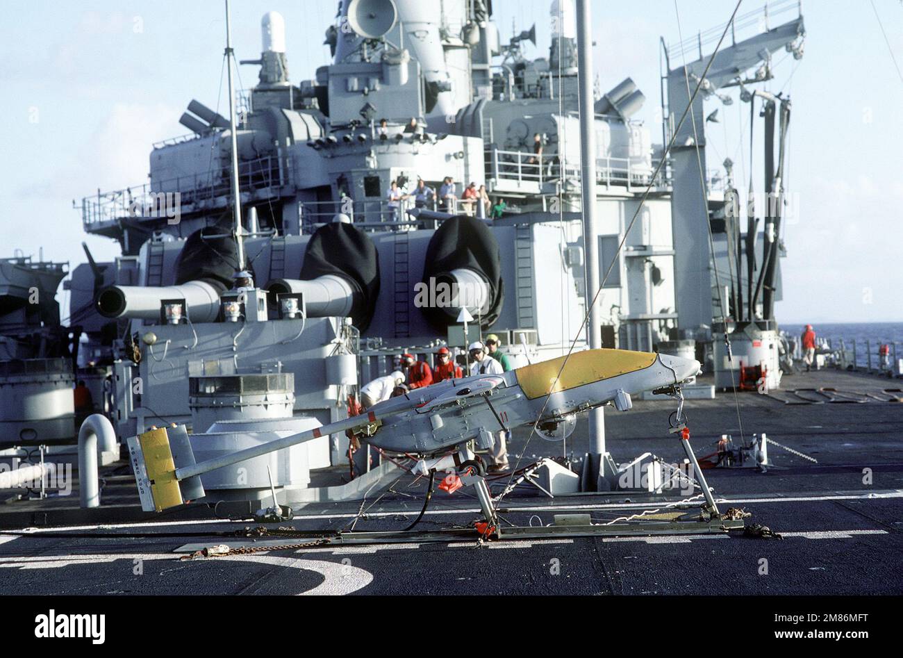 Crew members perform a final pre-launch check on a Pioneer I remotely ...