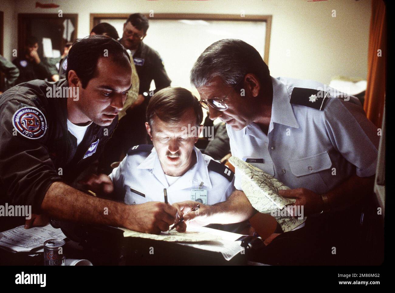 Captain Rick Vandam, left, CAPT. Vaugon Hanchett, center and Lieutenant ...