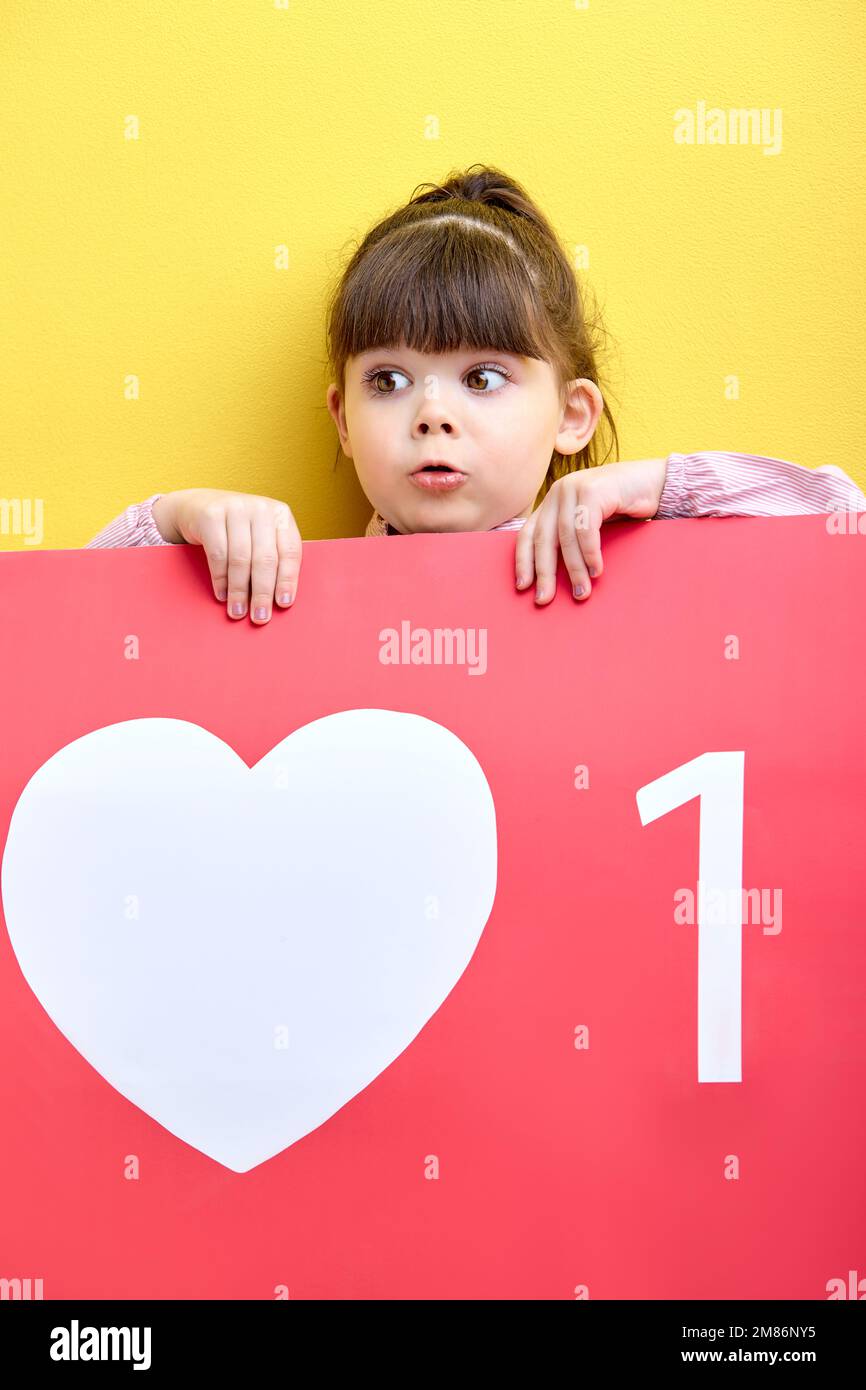 funny kid girl holding big red sign like, posing, little blogger get ...
