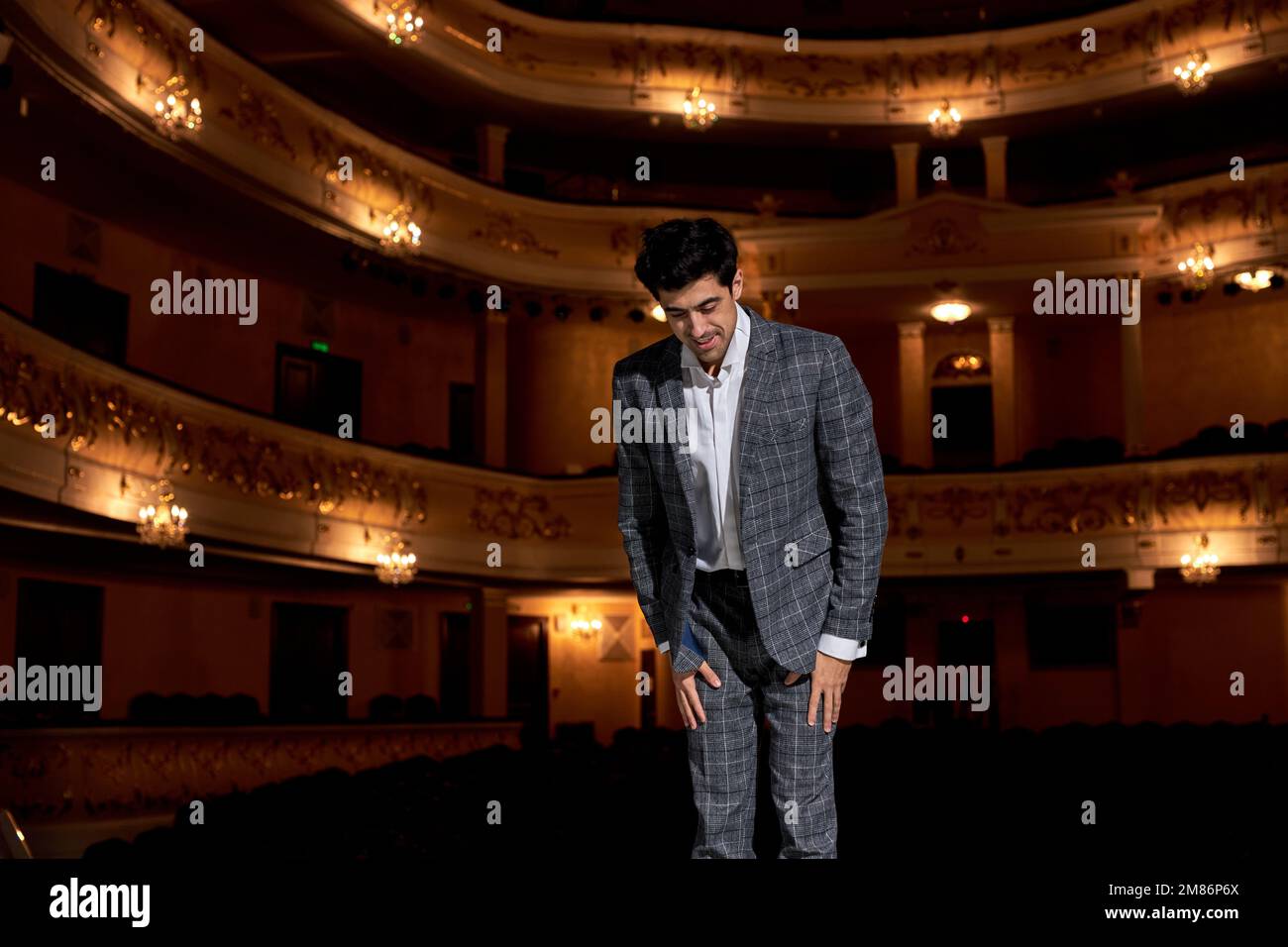 Great Motivational Speaker Stands on Stage, Expressing Gratitude After ...