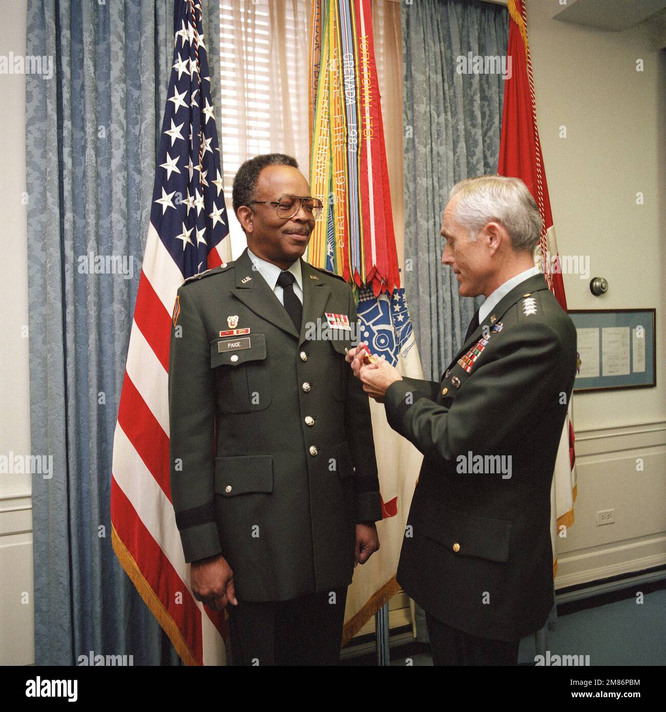 Army CHIEF of STAFF General Robert A. Wickham Jr., right, presents the ...