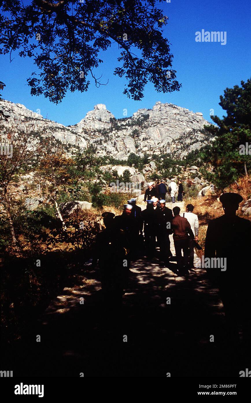 Enlisted personnel on liberty visit a rocky scenic area. The sailors ...