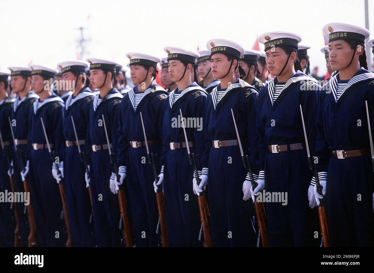 Members of a Chinese honor guard, armed with Type 56 assault rifles ...