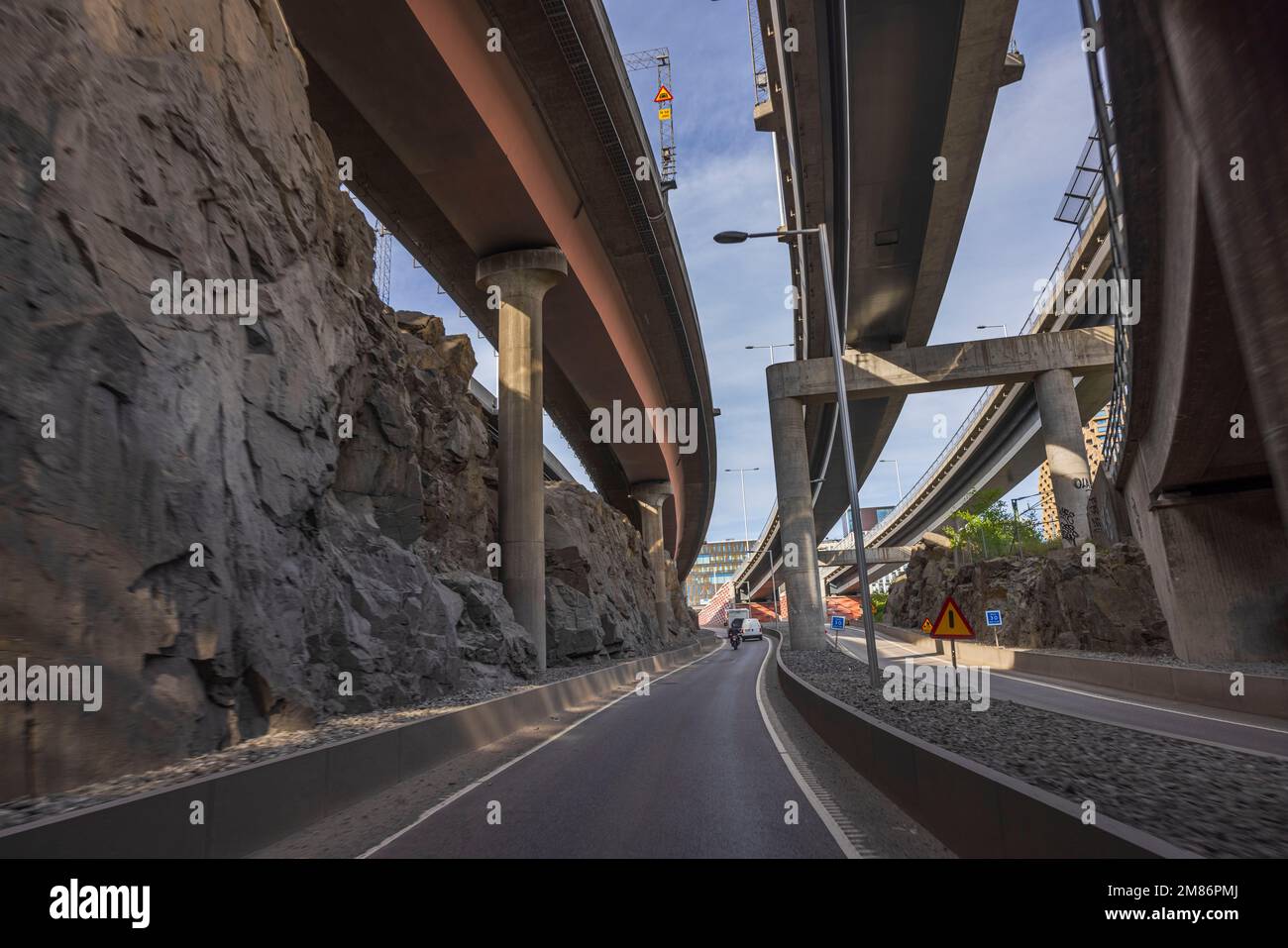 Technological view of road under bridge structures. Concept of modern ...