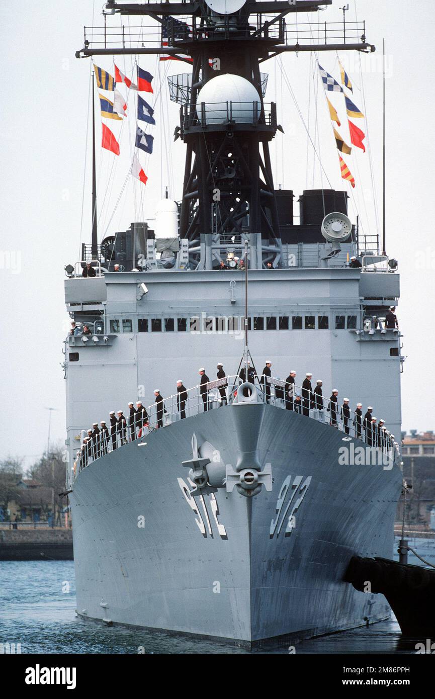Crew members man the rail as the destroyer USS OLDENDORF (DD-972 ...