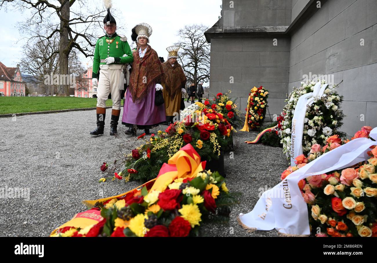Salem, Germany. 12th Jan, 2023. A traditional costume group walks past ...