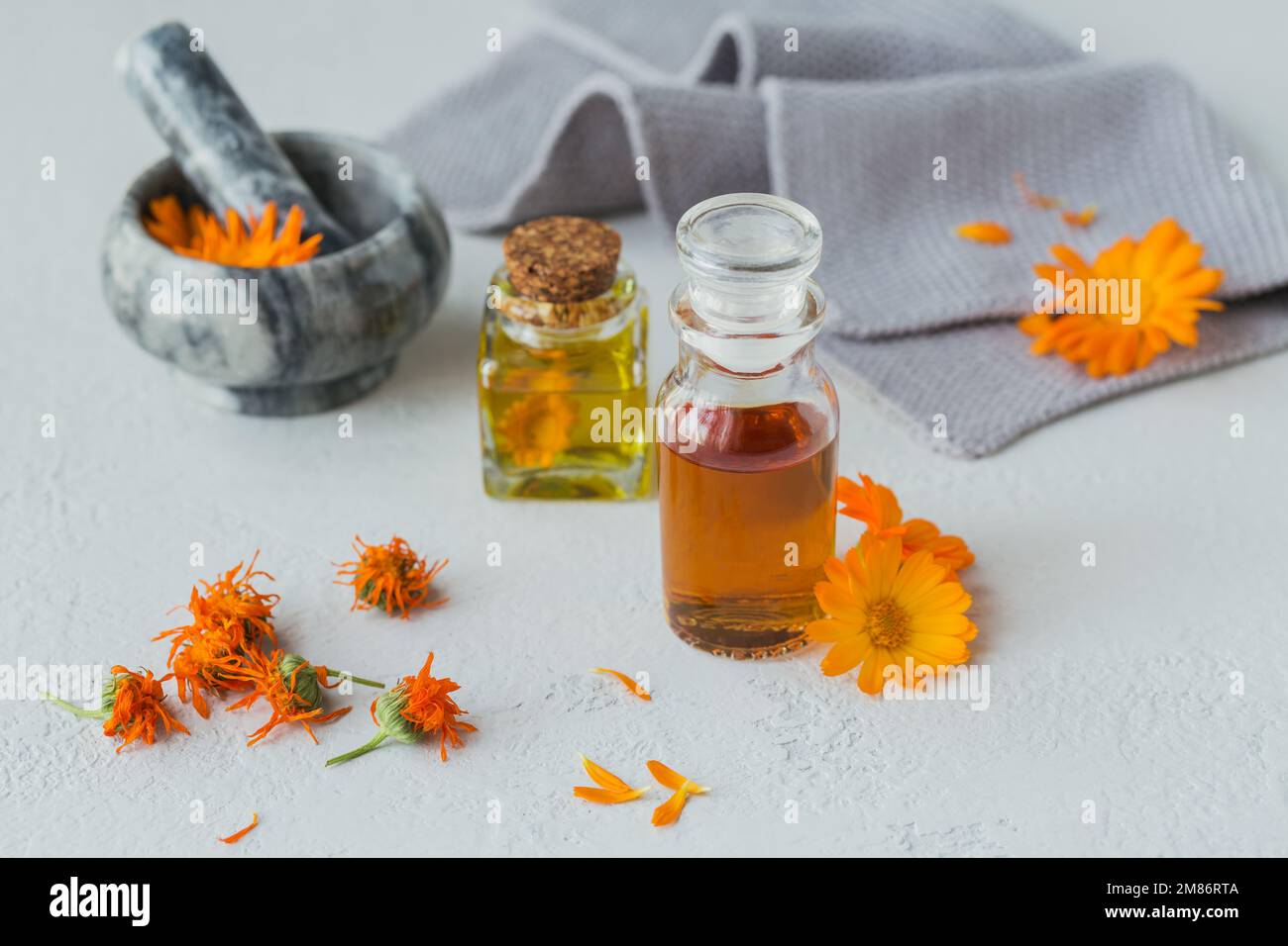 Natural cosmetic oil, tincture or infusion and mortar with Calendula ...