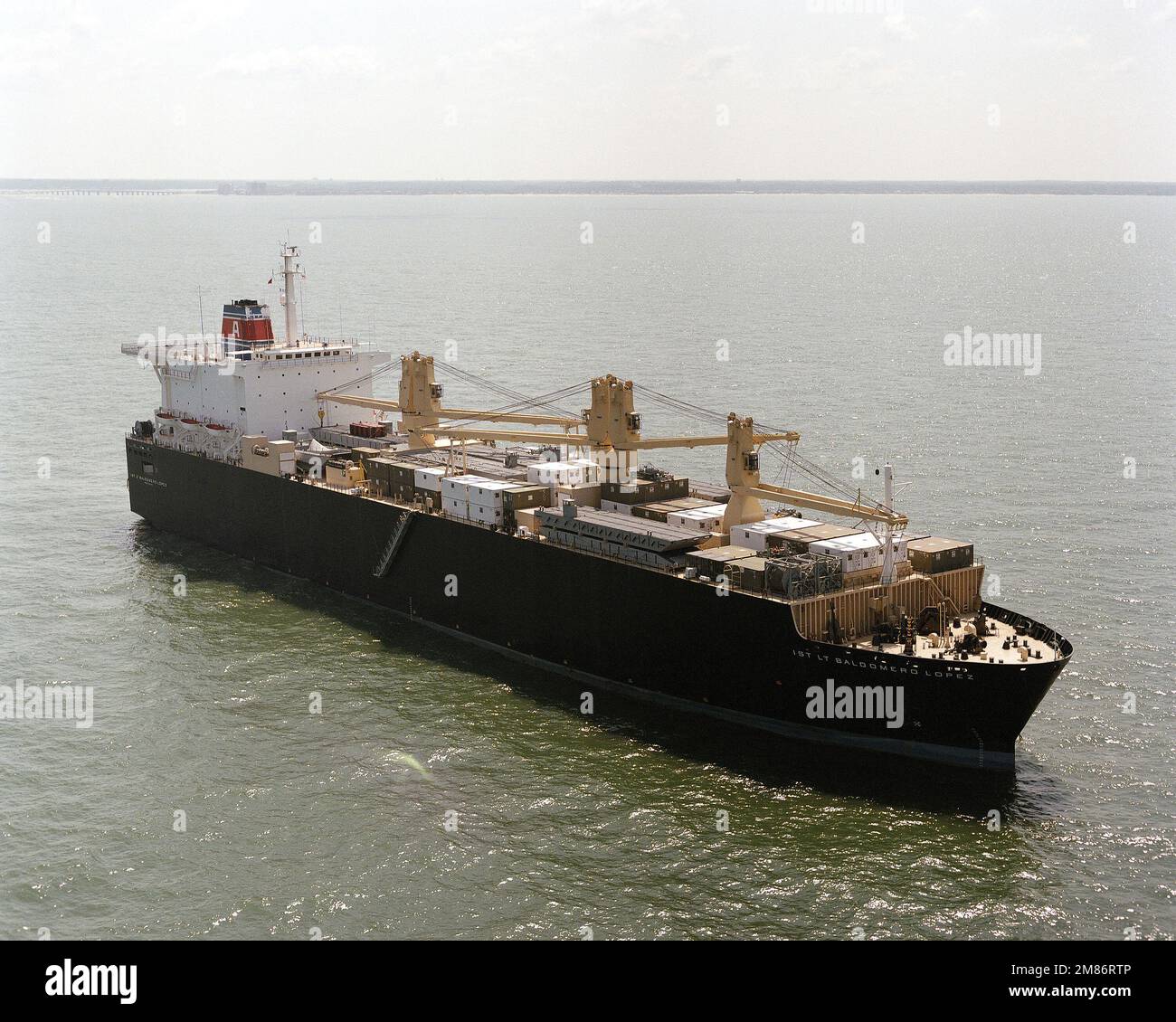 A starboard bow view of the maritime prepositioning ship SS 1ST LT ...