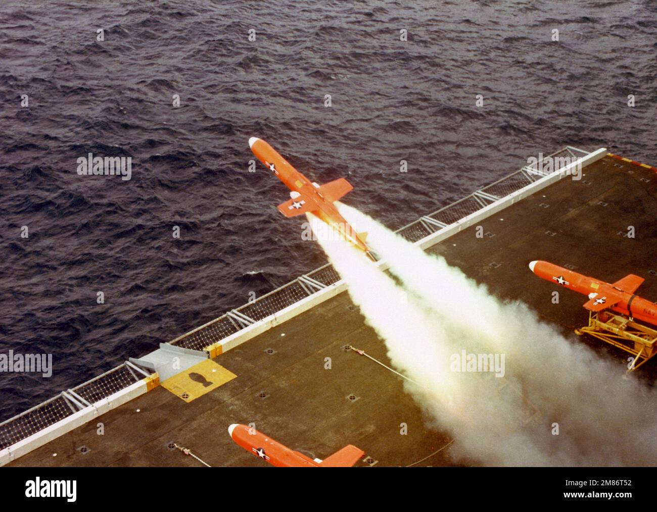 An MQM-74C target drone is launched during a missile firing exercise ...