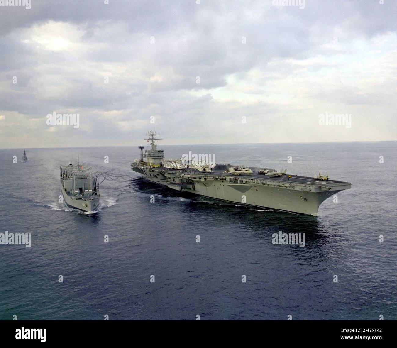 The fleet oiler USS CALOOSAHATCHEE (AO-98) replenishes the nuclear ...