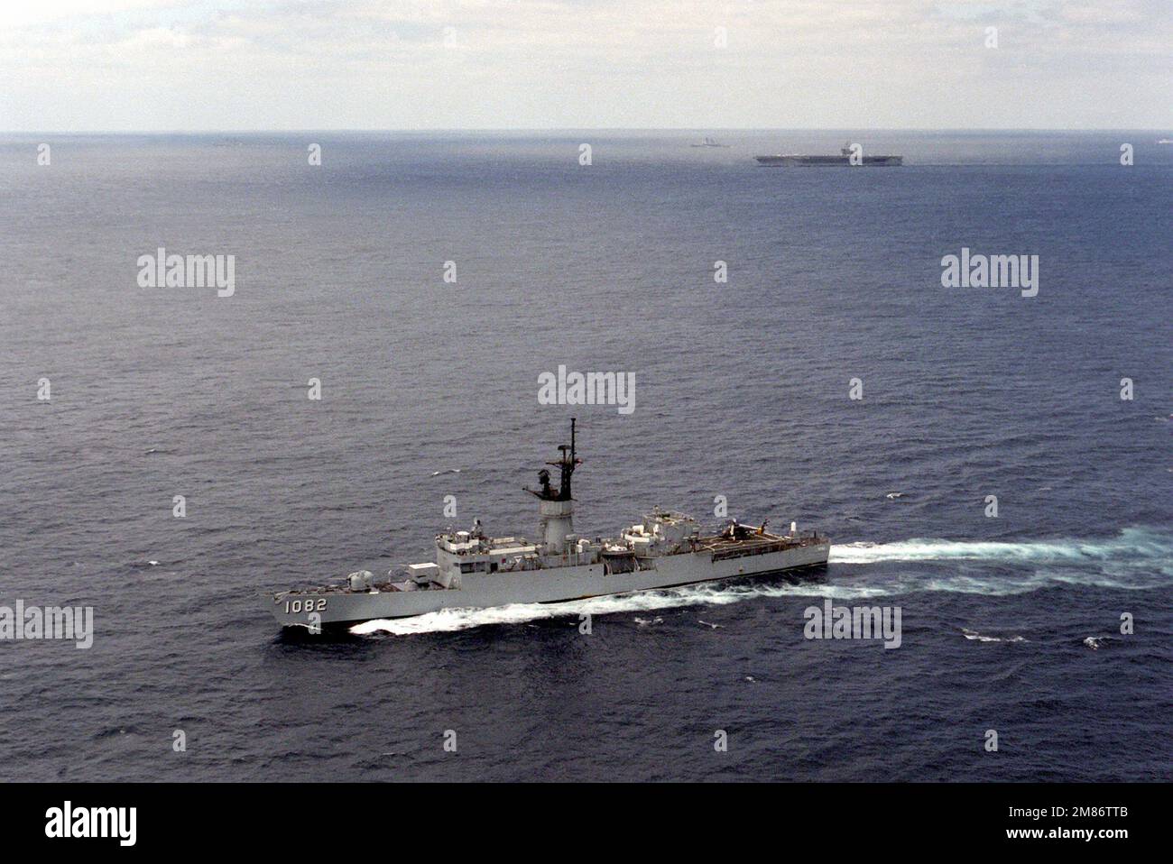 An elevated port bow view of the frigate USS ELMER MONTGOMERY (FF-1082 ...