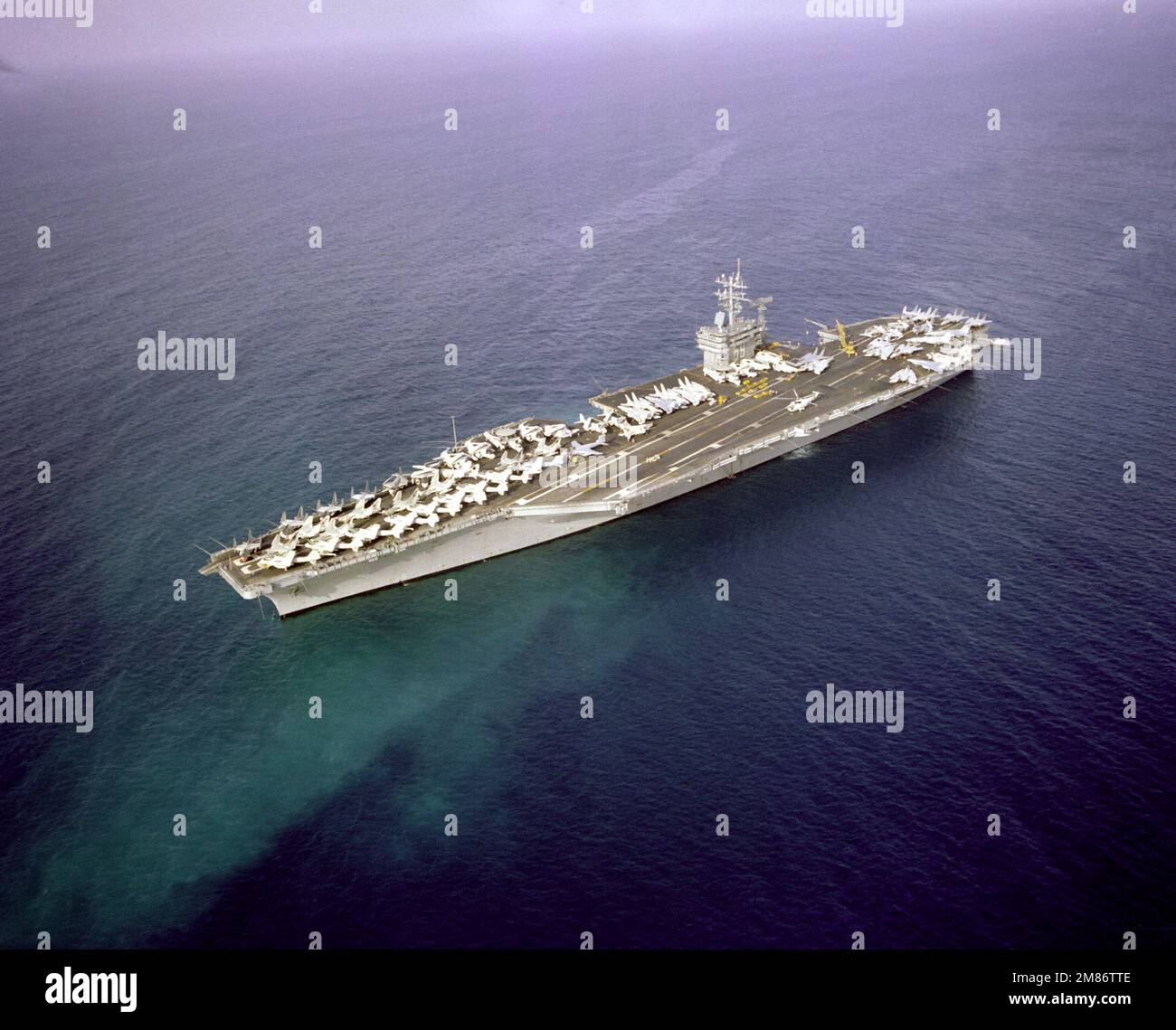 A port bow view of the nuclear-powered aircraft carrier USS DWIGHT D ...