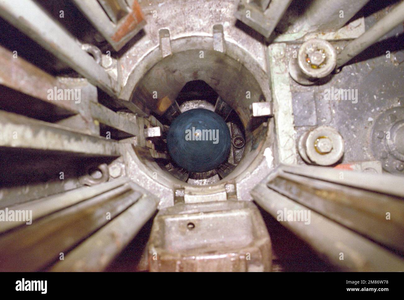 As seen from above, a 2,700-pound dummy projectile travels up a hoist ...
