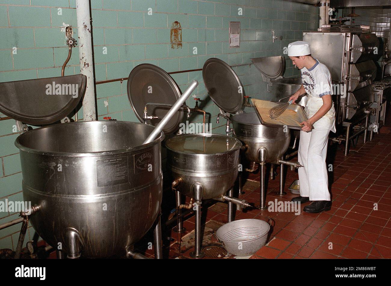 Mess Management SPECIALIST 2nd Class Rachel Phillips adds thickener to ...