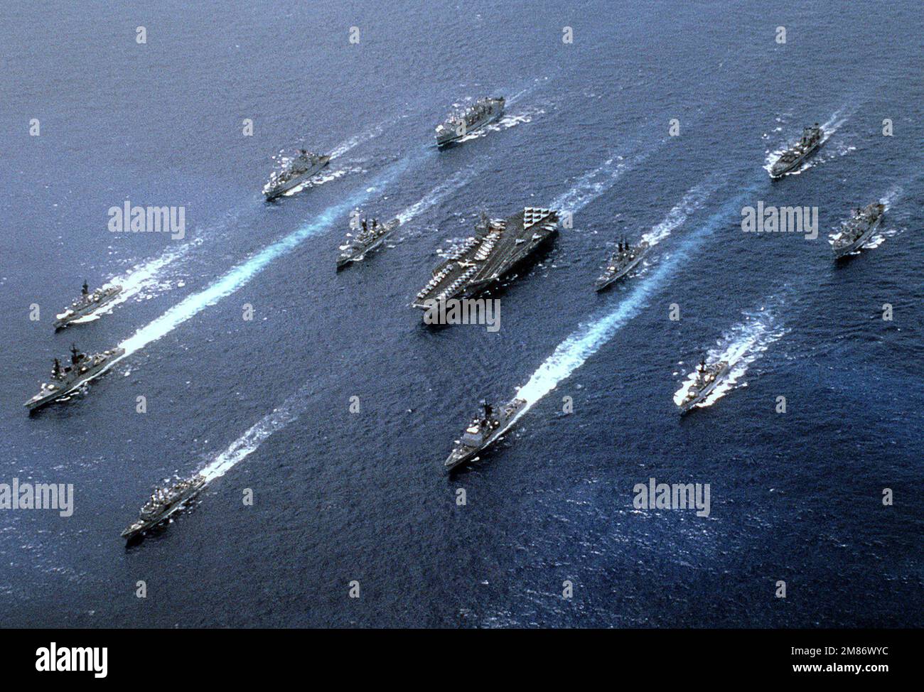 An elevated view of the nuclear-powered aircraft carrier USS CARL ...