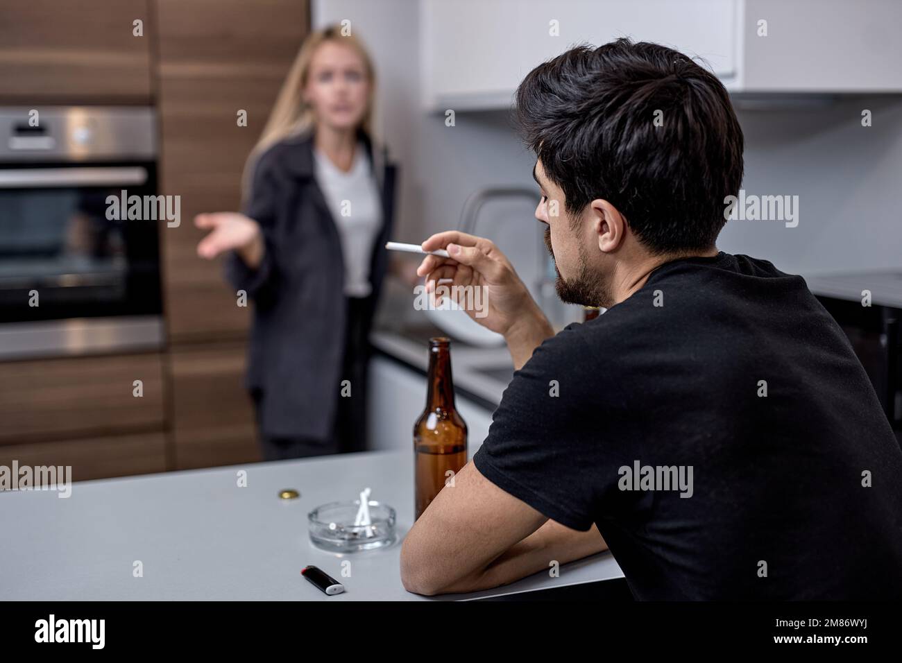 Smoking man angry woman hi-res stock photography and images - Alamy