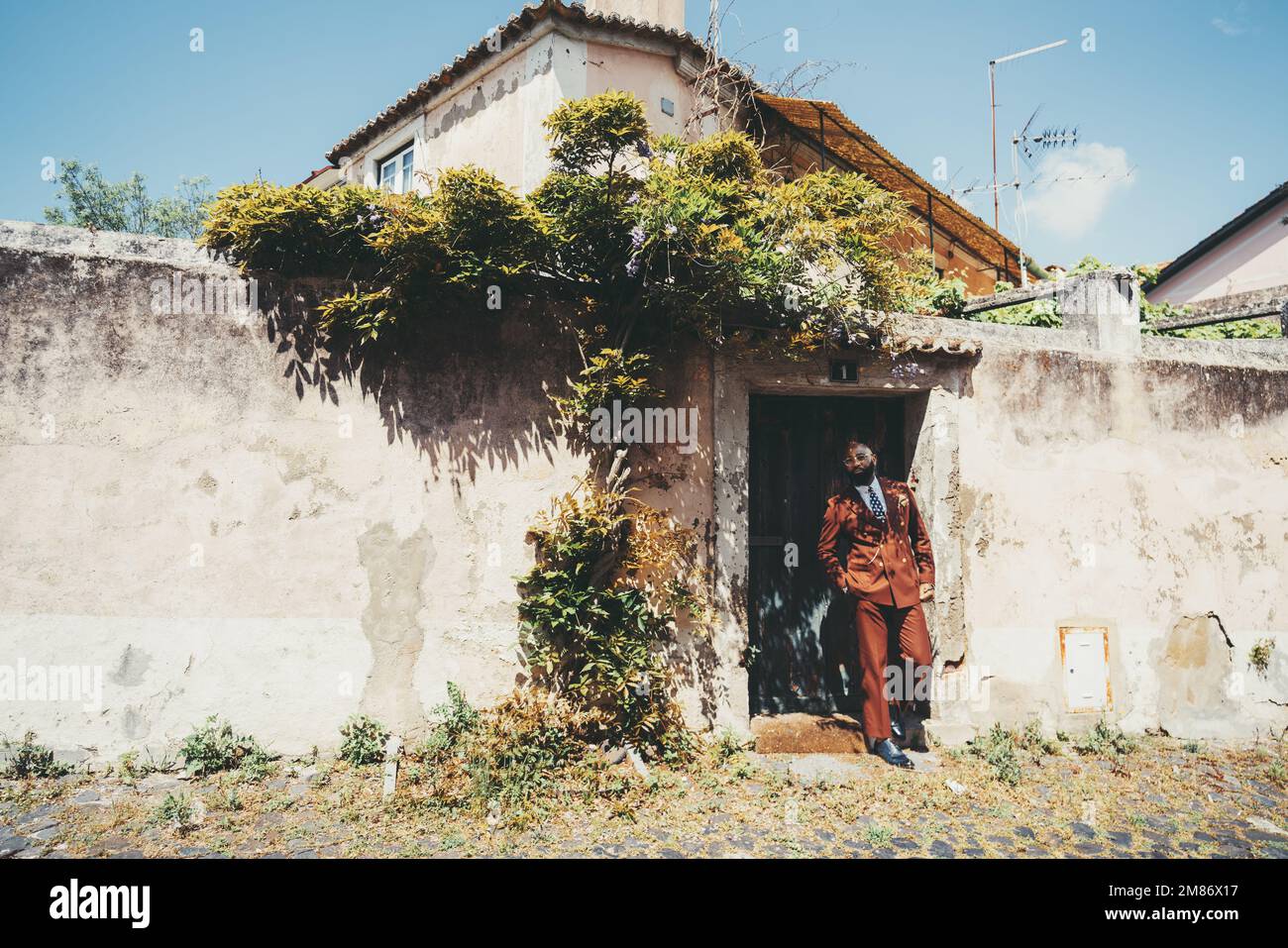 View of a sophisticated mature hairless black guy with a full-grown ...