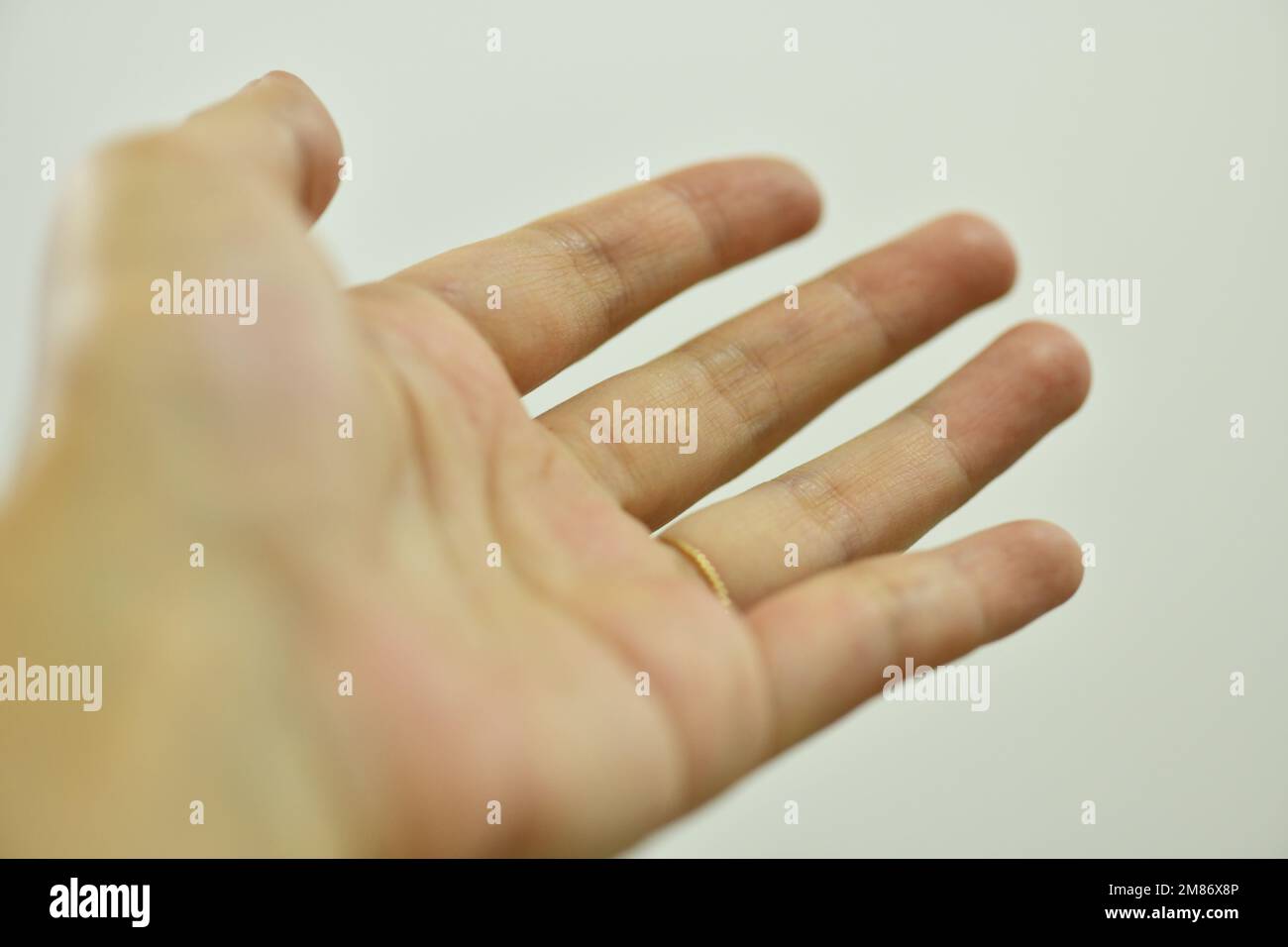 The palm of the man reach and ready to help or receive Stock Photo - Alamy