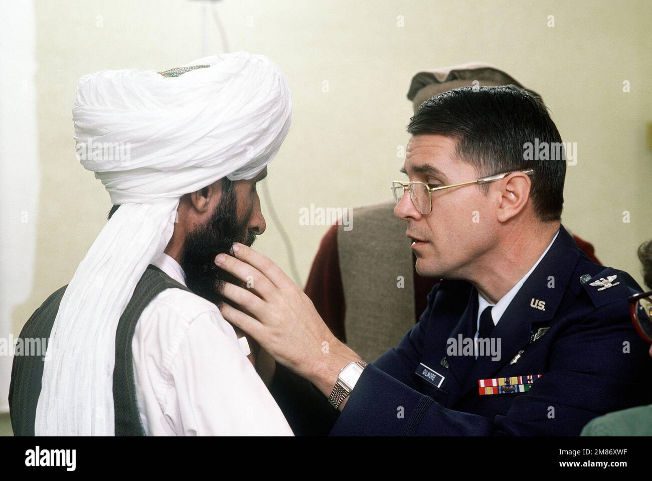 A doctor at the Wiesbaden Regional Medical Center examines a wounded ...