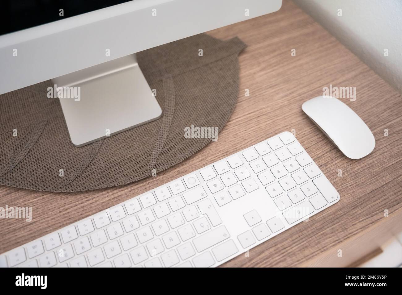 The modern workplace with desktop computer, working table, keyboard and mouse Stock Photo - Alamy