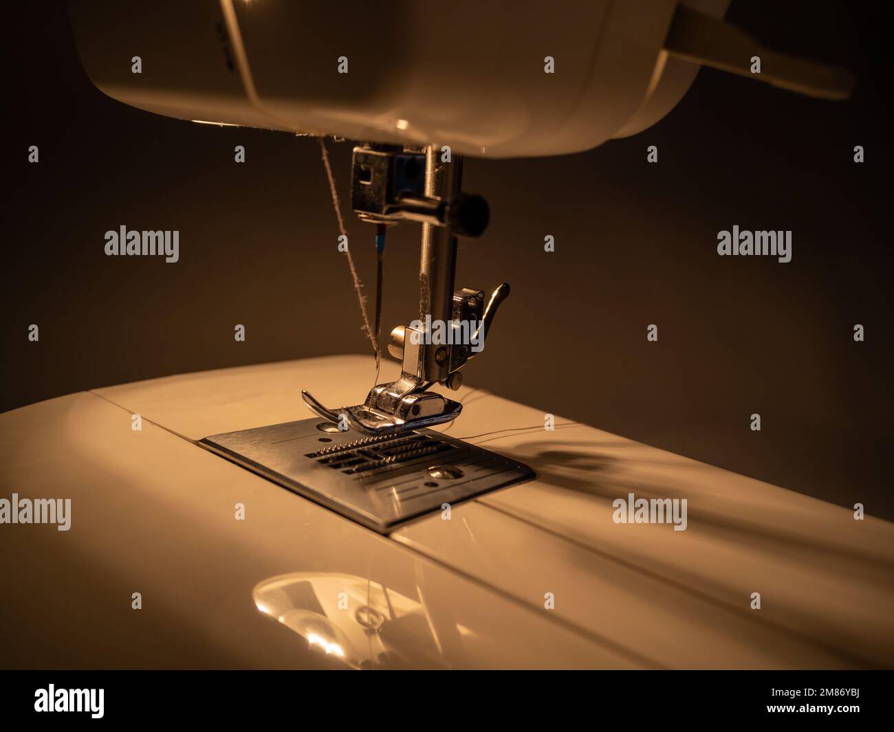 Sewing machine on dark hi-res stock photography and images - Alamy