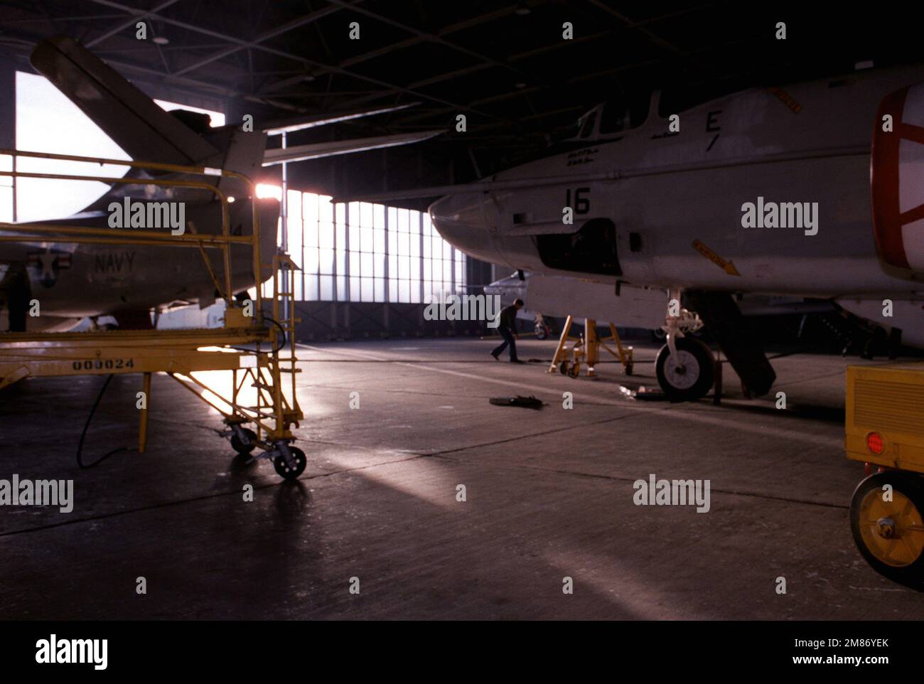 Mechanics from Fleet Air Reconnaissance Squadron 2 (VQ-2) work on some ...