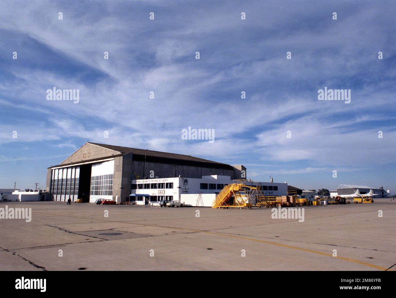 A view from the flight line of the maintenance hangar and ...
