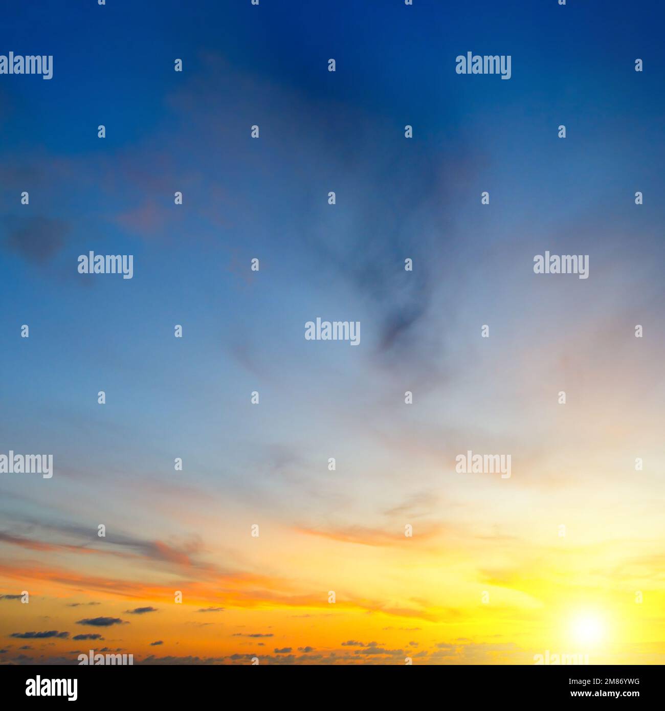 Cloudy sky and bright sunrise over the horizon Stock Photo - Alamy