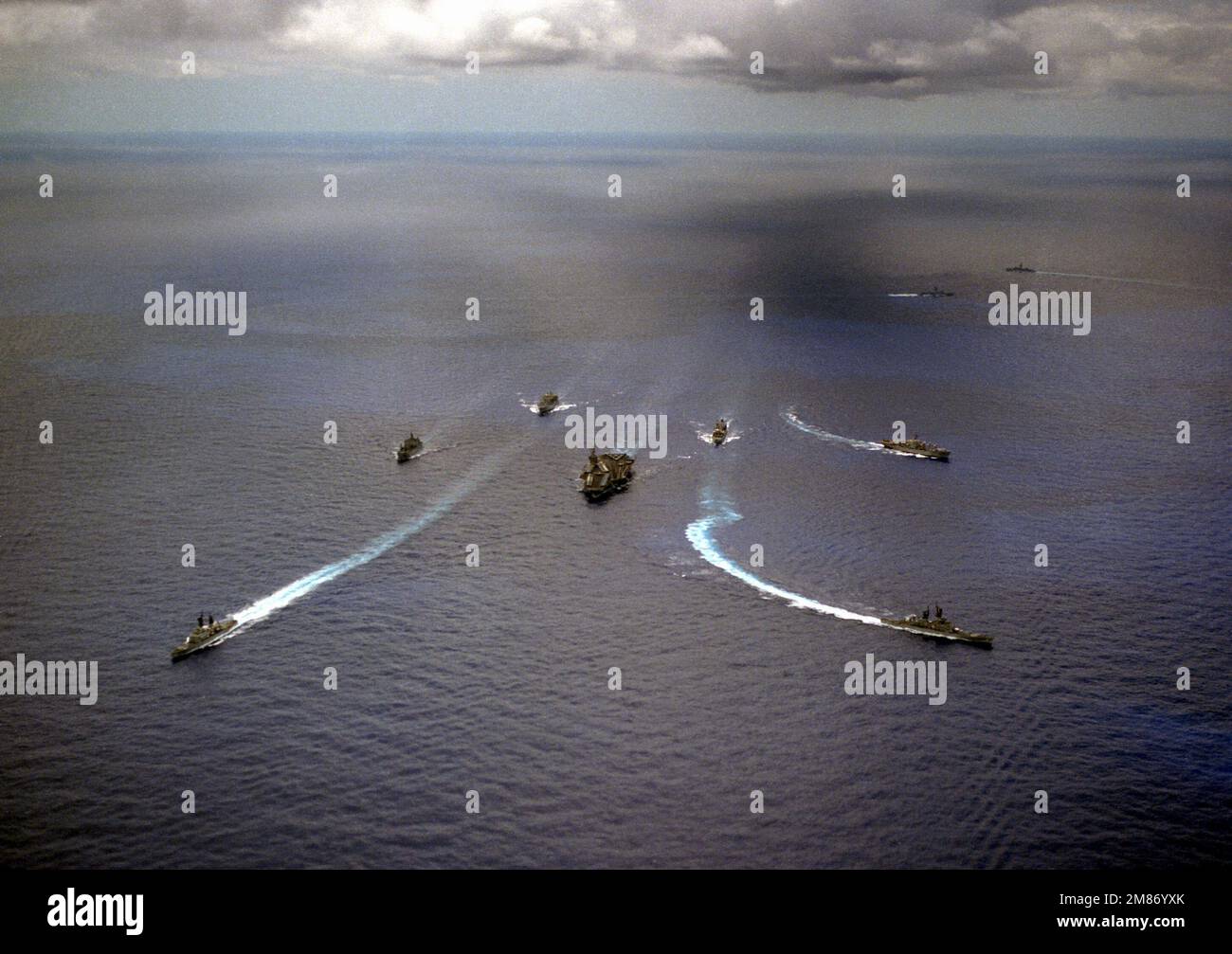 An aerial bow view of ships of carrier Battle Group Charlie fanning out ...