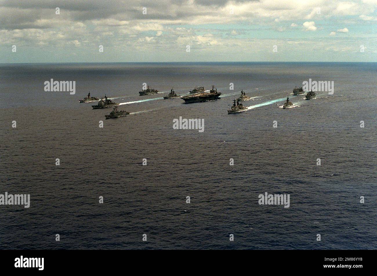 An aerial starboard bow view of Battle Group Charlie underway in ...