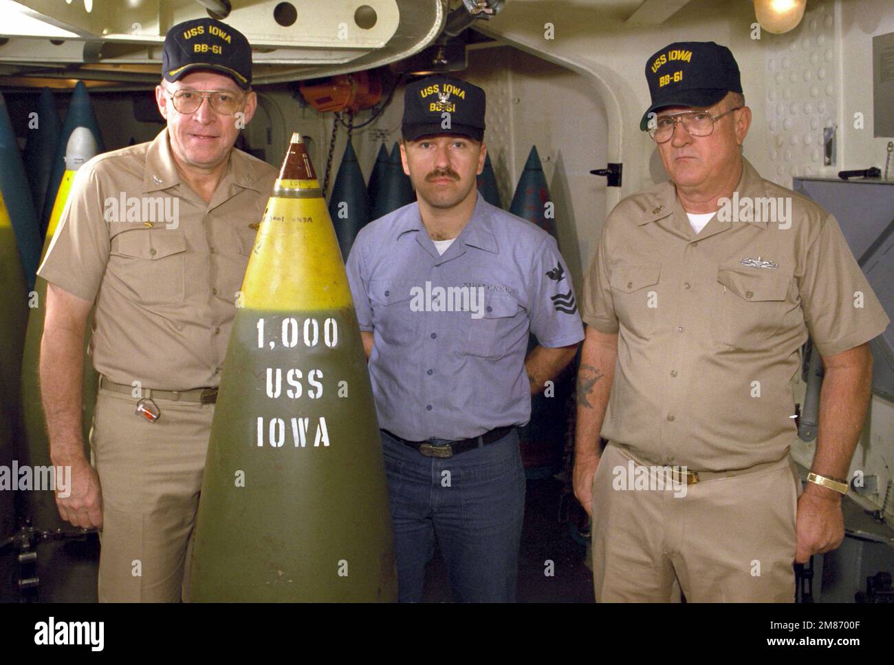 CPT Larry Seaquist, left, commanding officer of the battleship USS IOWA ...
