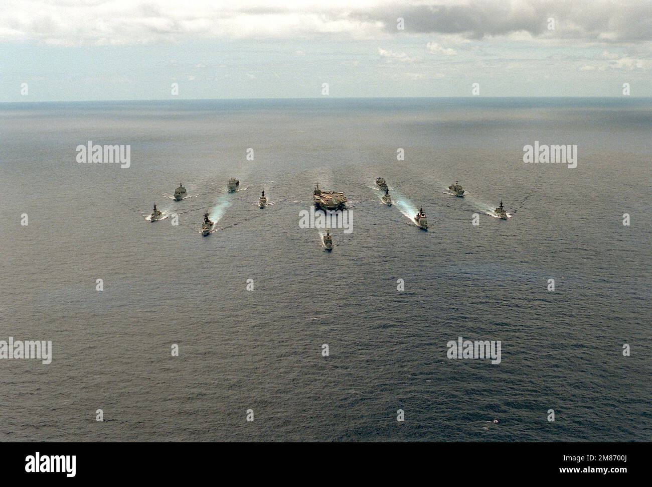 An aerial bow view of Battle Group Charlie underway in formation. The ...