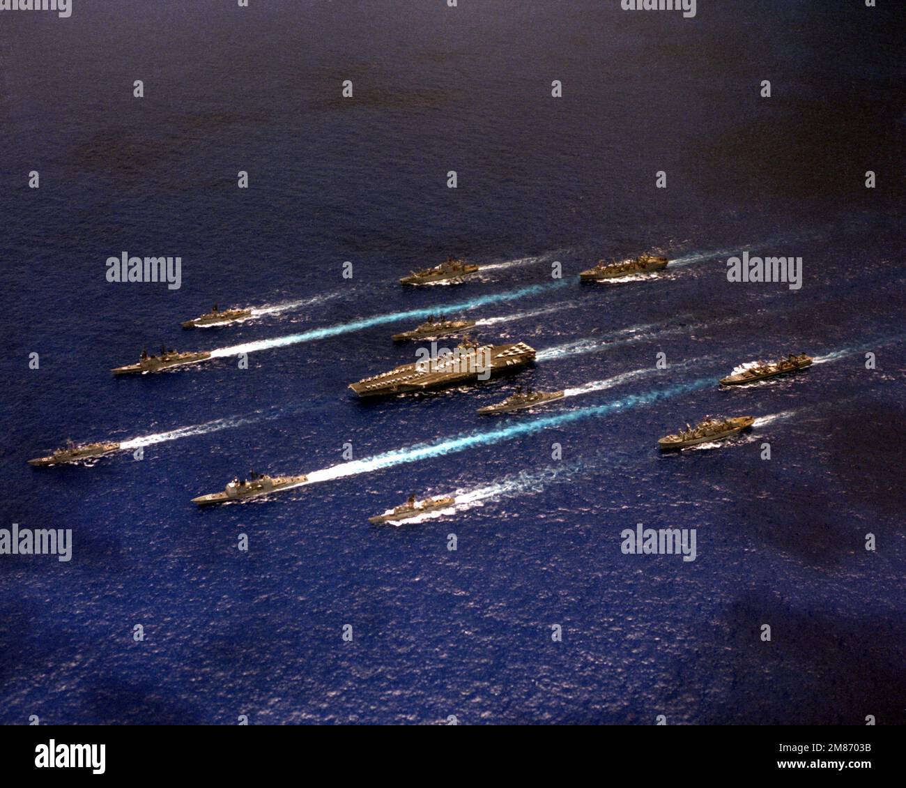An aerial port bow view of Battle Group Charlie underway in formation ...