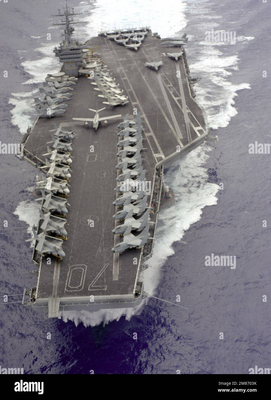 An elevated bow view of the nuclear-powered aircraft carrier USS CARL ...