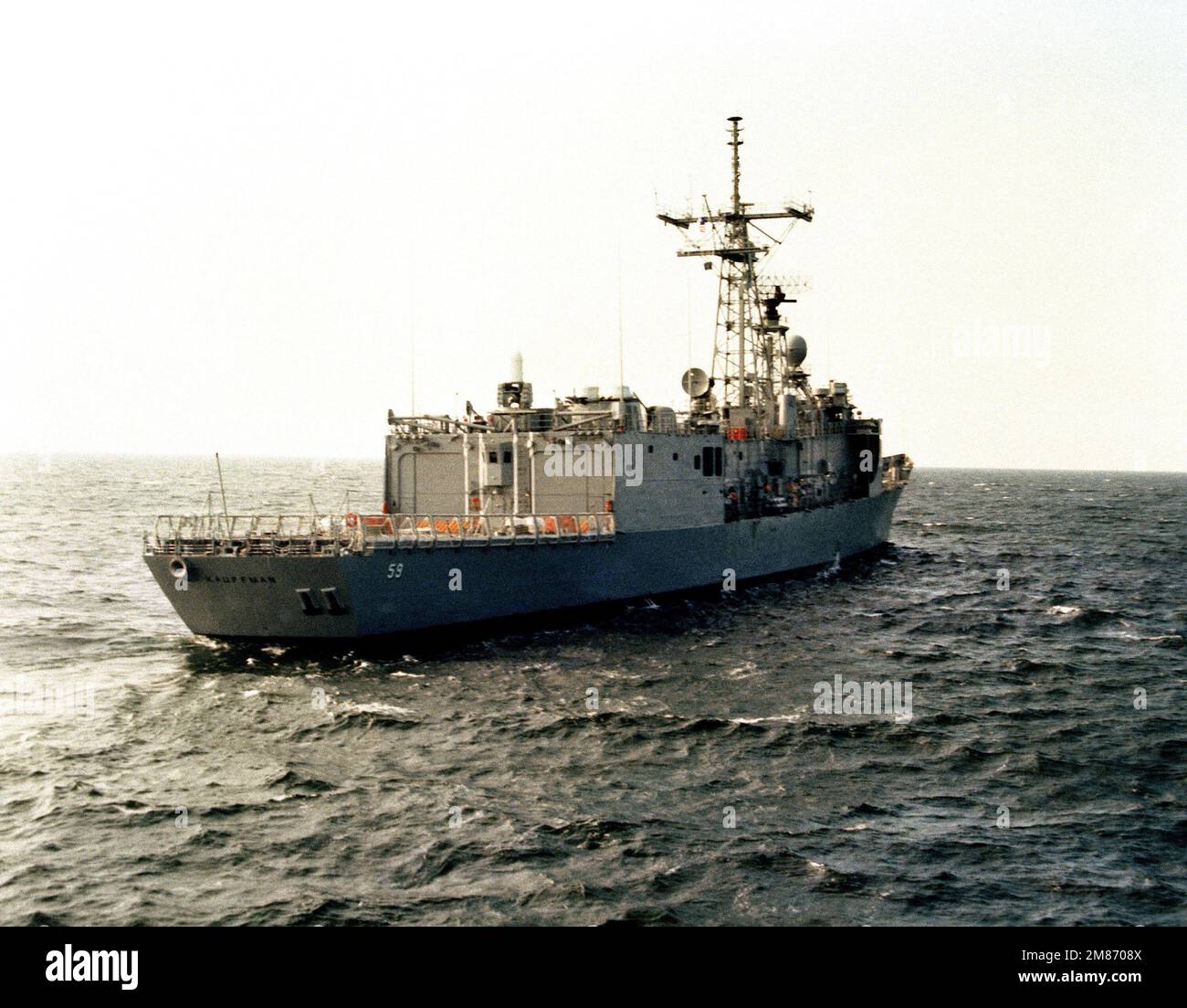 A starboard quarter view of the guided missile frigate USS Kauffman ...