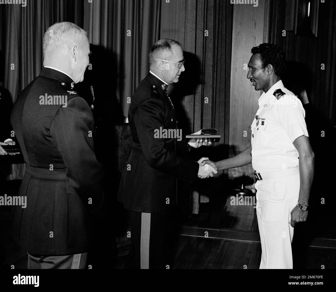 LT Hafiz of the Kuwaiti armed forces shakes hands with BGEN Gene A ...