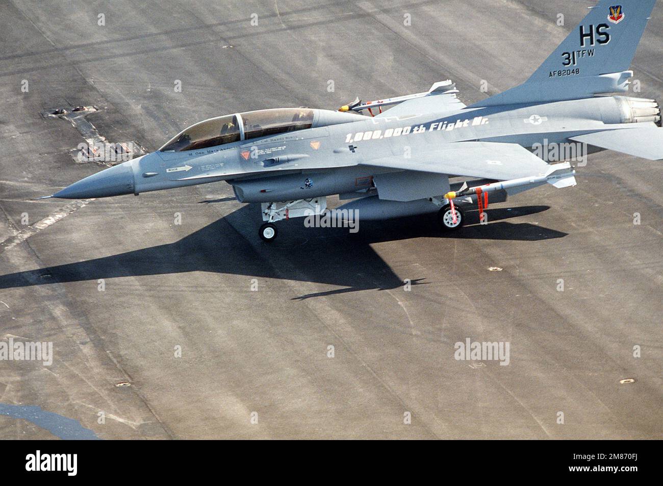 An elevated left side view of the F-16B Fighting Falcon aircraft of the ...