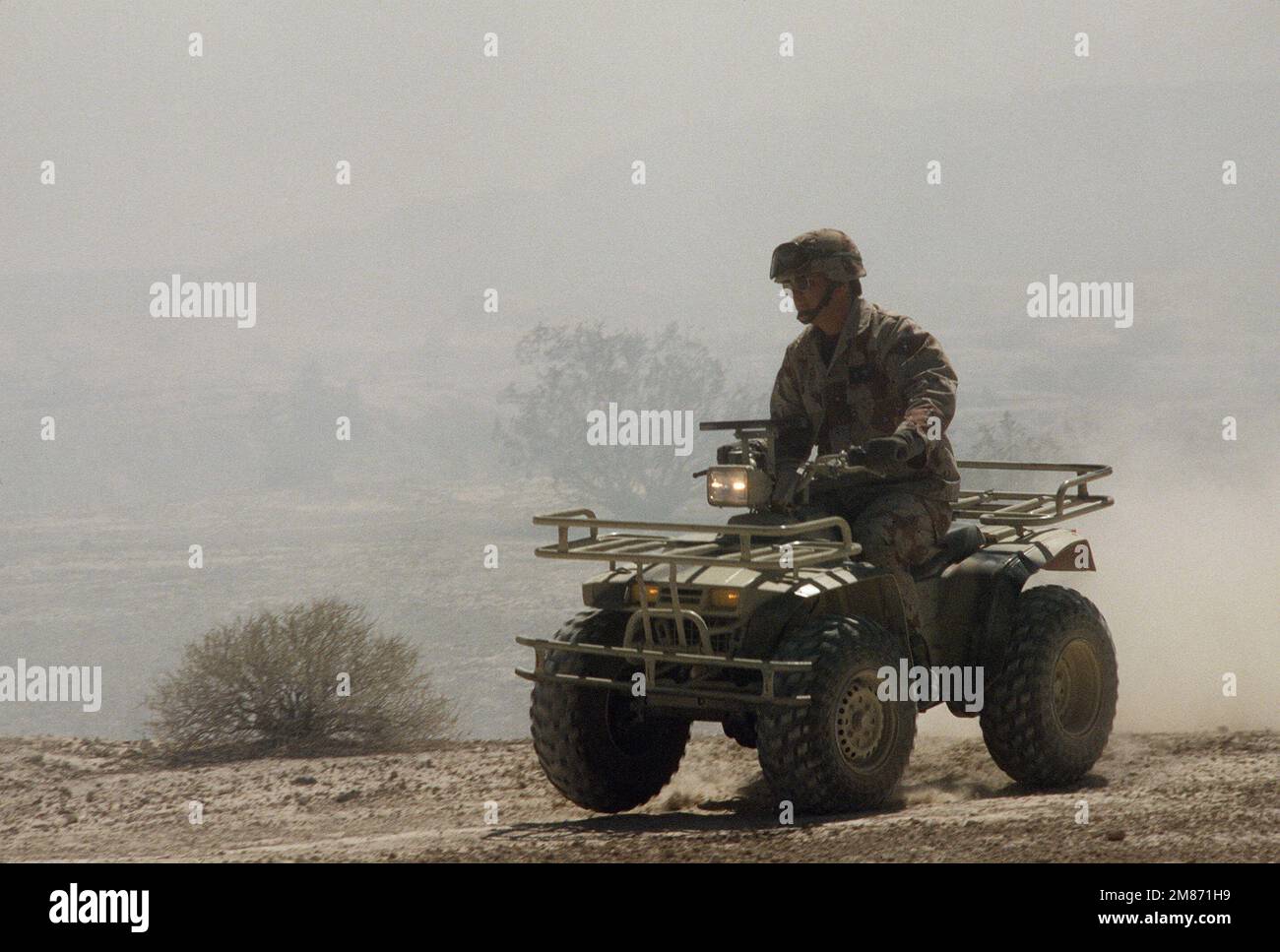 An airman surveys the area using an all-terrain vehicle during Silver ...