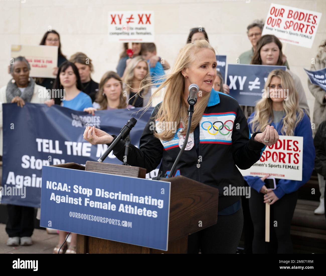 Former olympic swimmer Nancy Hogshead-Makar speaks at a rally on ...