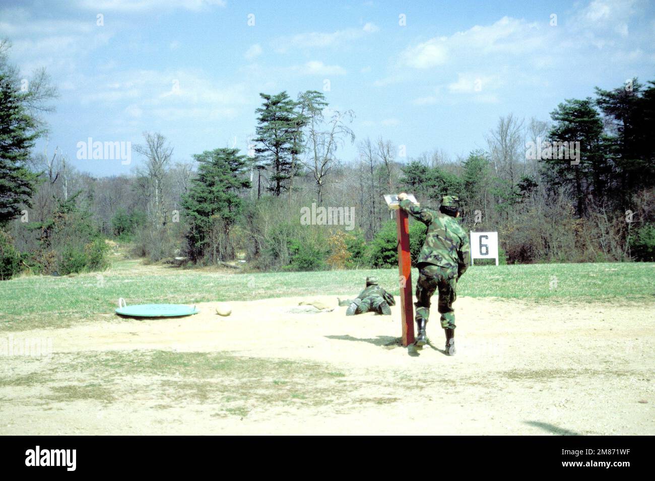 Soldiers of the 1101st Signal Brigade practice on the firing range ...