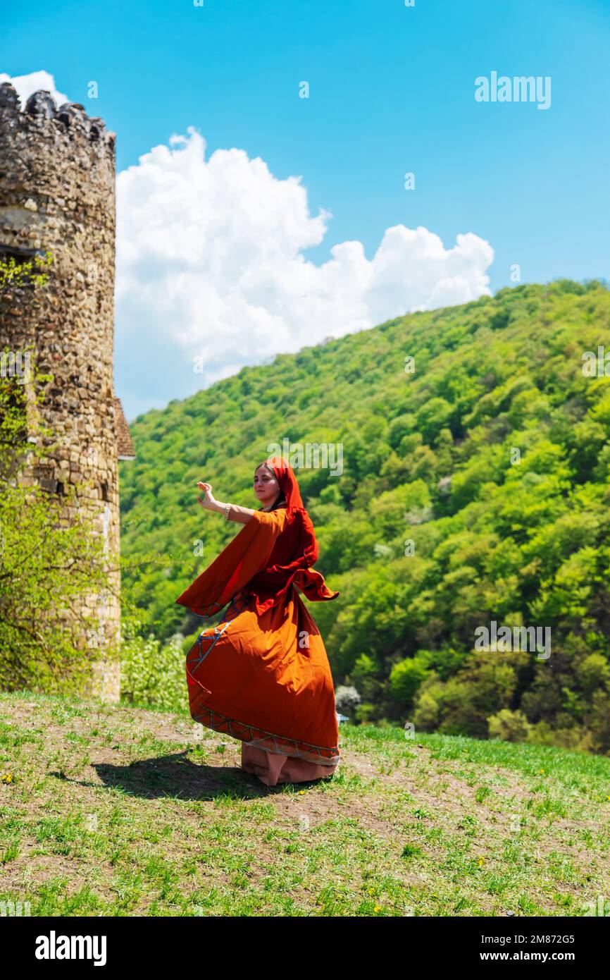Georgian girl in national costume dances Georgian national dances ...