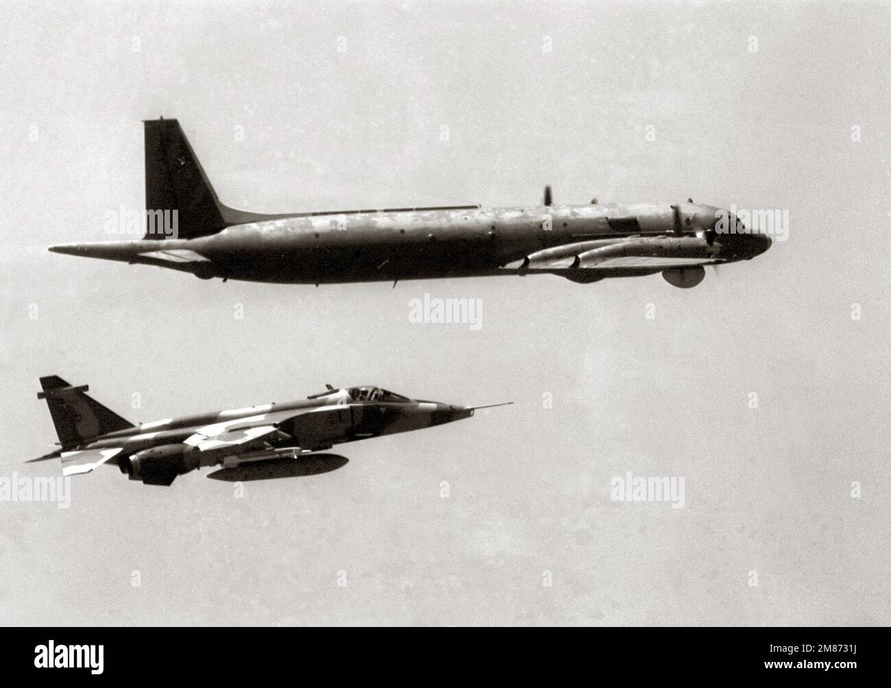 An air-to-air right side view of a Sepecat Jaguar aircraft approaching ...