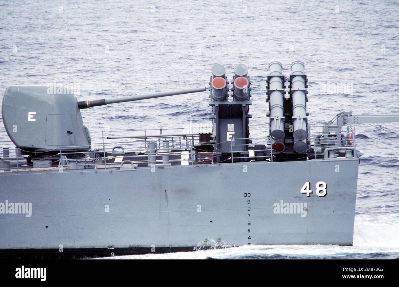 A port view of the aft section of the guided missile cruiser USS ...