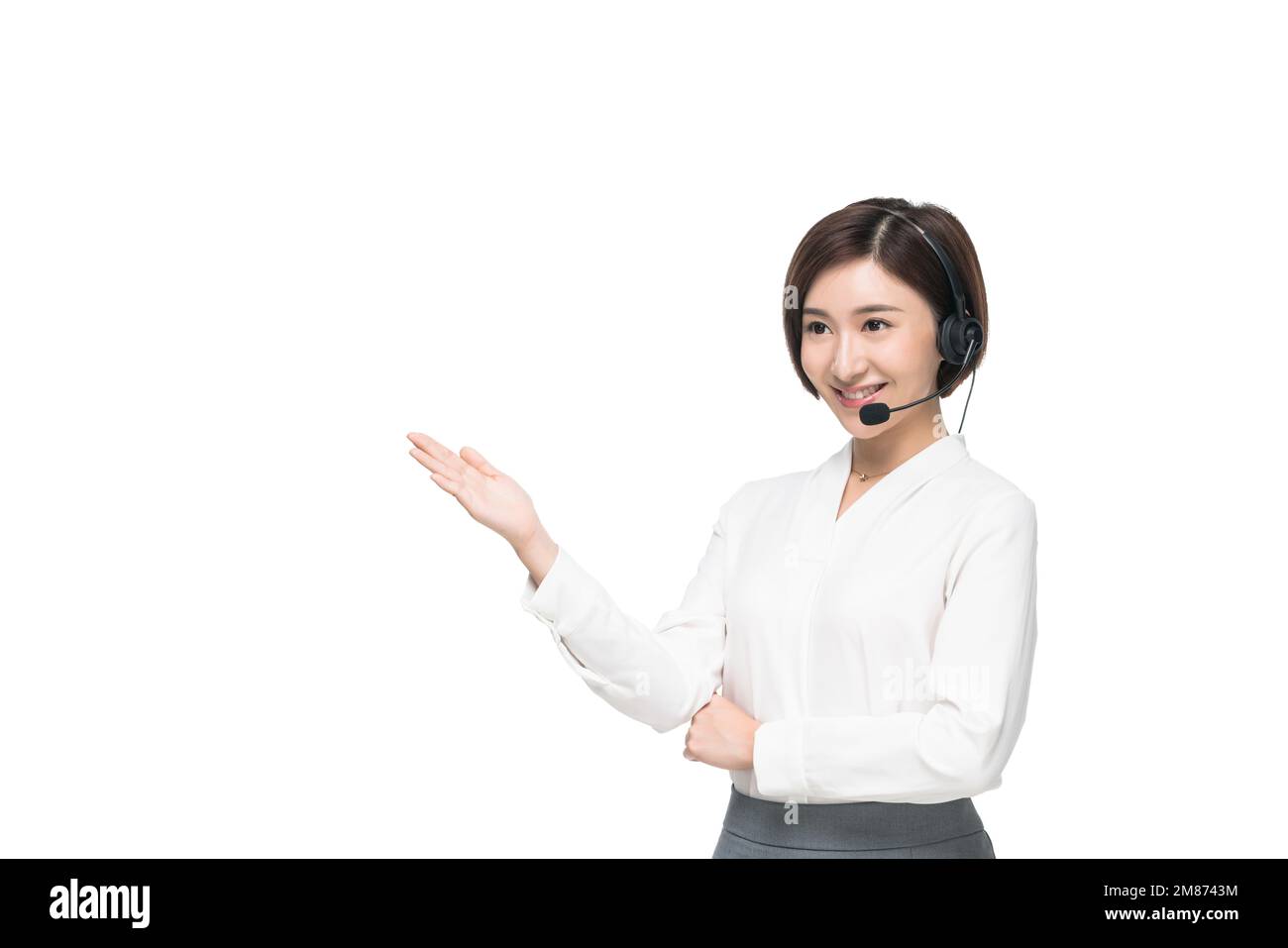 The female customer service staff wearing headphones Stock Photo - Alamy