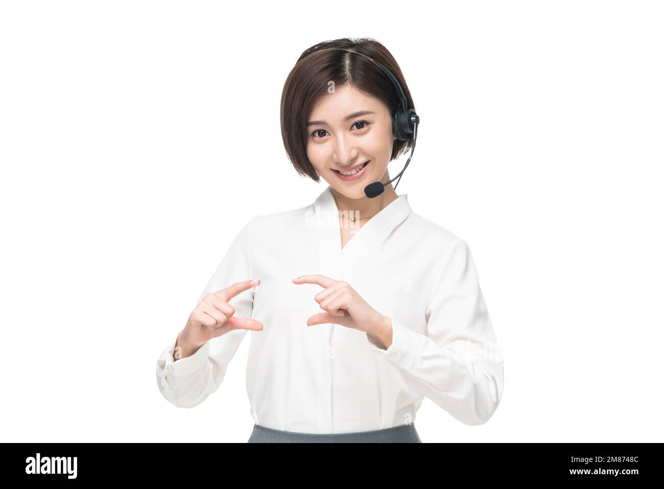 The female customer service staff wearing headphones Stock Photo - Alamy